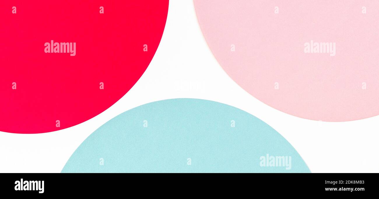 Abstract color paper background. Light blue, pink, red color round ...