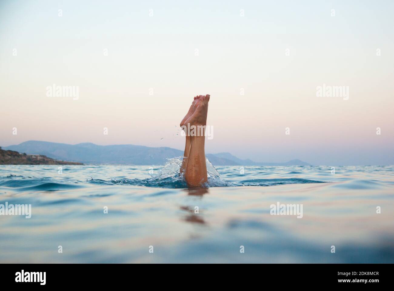 Feet in sea Stock Photo - Alamy
