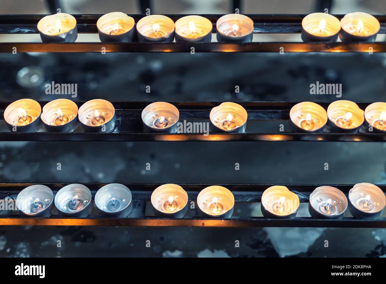 Rack of candles hi-res stock photography and images - Alamy