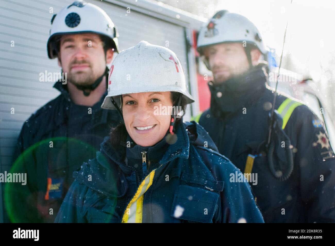 Firefighters looking at camera Stock Photo - Alamy