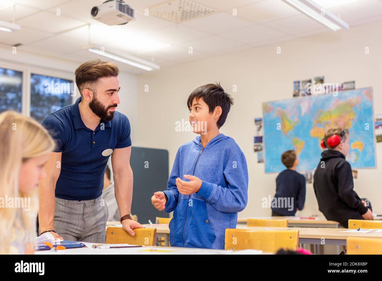 Teacher schoolboy in classroom hi-res stock photography and images - Alamy