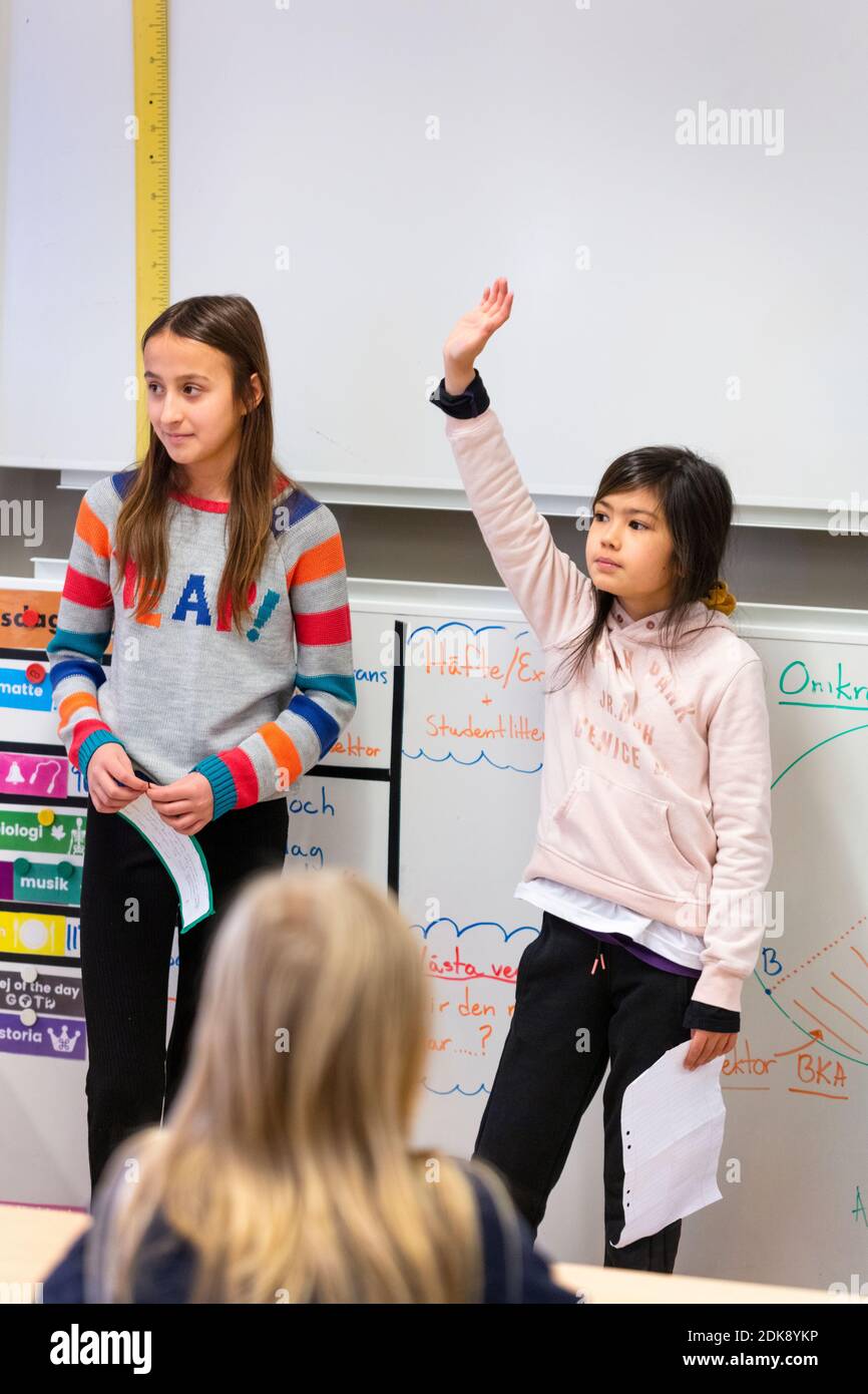 Girls in classroom Stock Photo - Alamy
