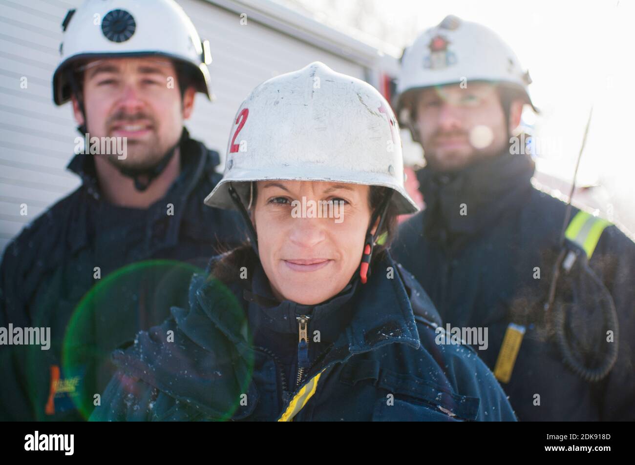 Firefighters looking at camera Stock Photo - Alamy
