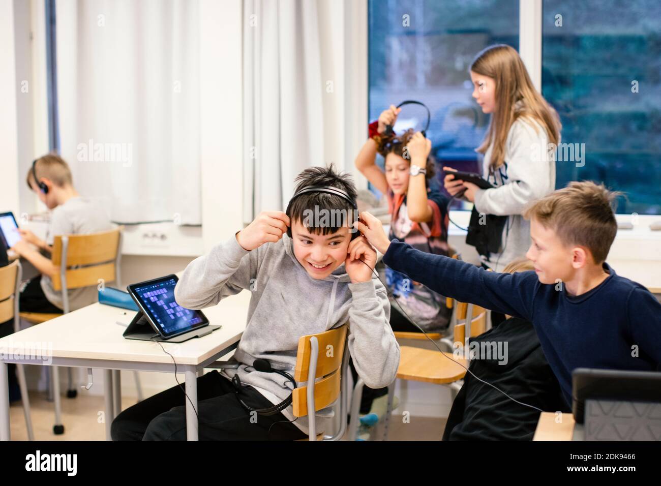 Children sitting in classroom Stock Photo - Alamy