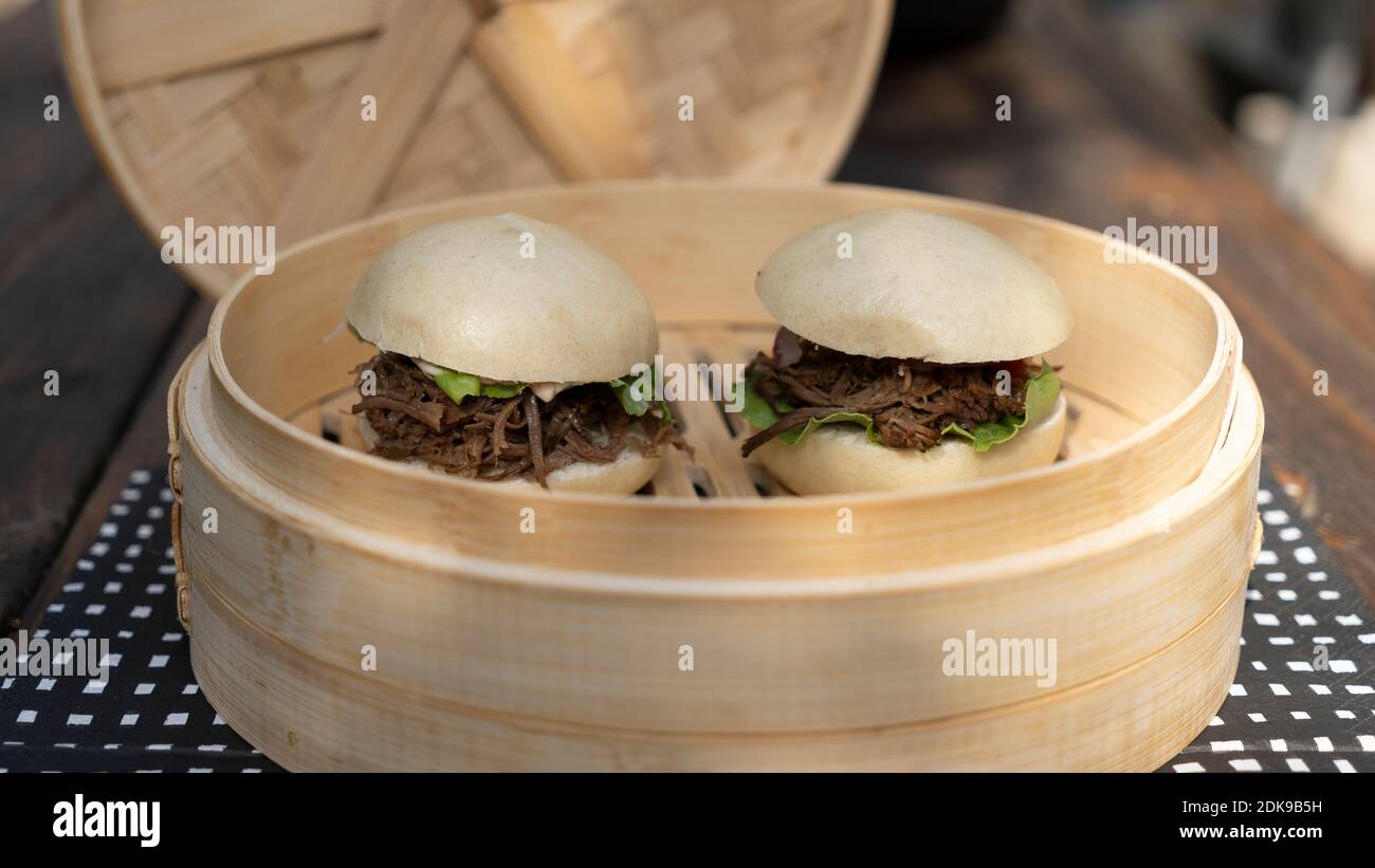 Steamed Asian bun with beef and vegetables Stock Photo - Alamy