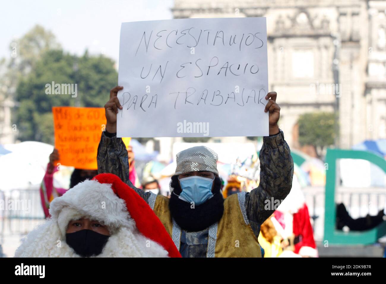 A person disguised as Santa Claus protests against Government of Mexico ...