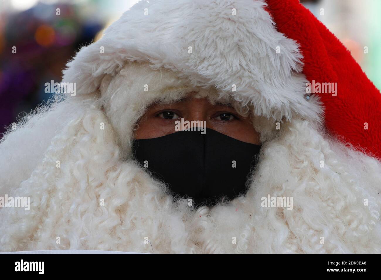A person disguised as Santa Claus protests against Government of Mexico ...