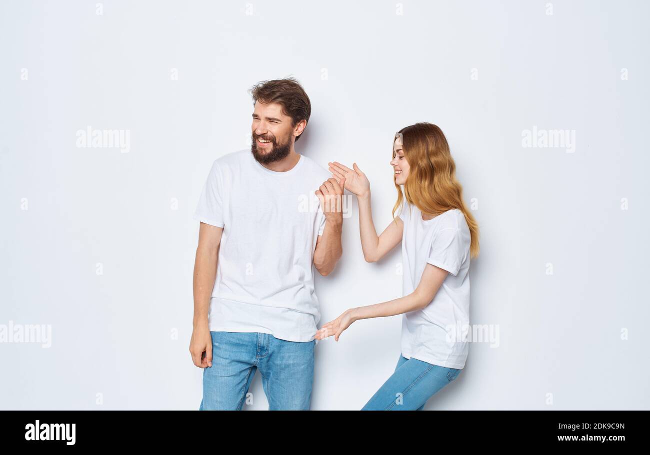 The guy with the woman gestures with his hands fun friends emotions ...