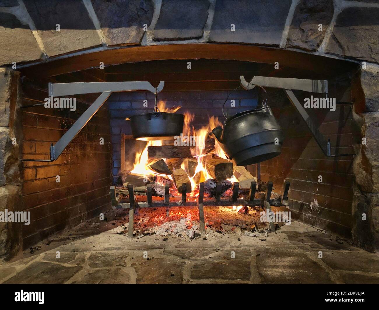 Food Cooking Over Fire At Fireplace Stock Photo - Alamy