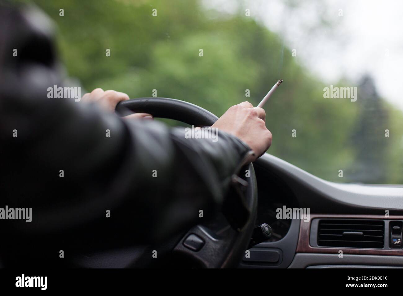 Smoking driving car hi-res stock photography and images - Alamy