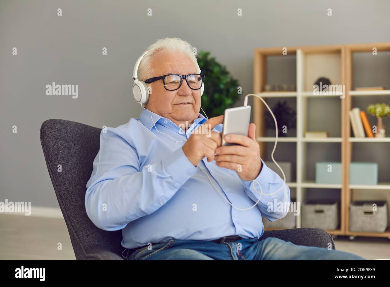 Senior on telephone at home hi-res stock photography and images - Alamy