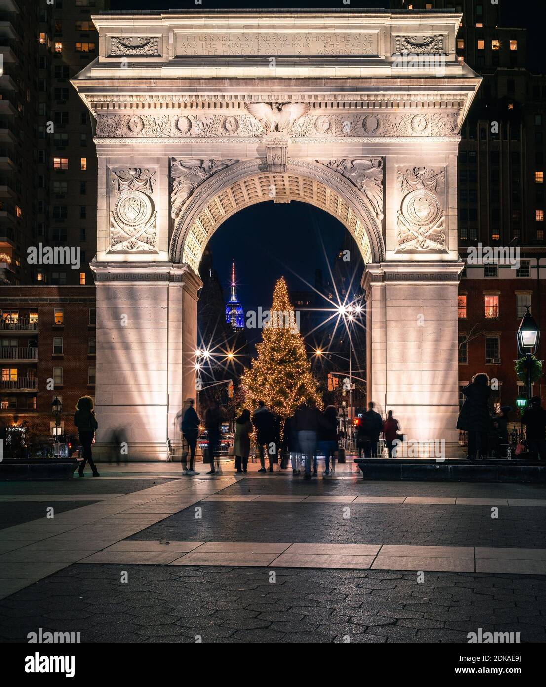 People In Front Of Illuminated Gate At Night Stock Photo - Alamy