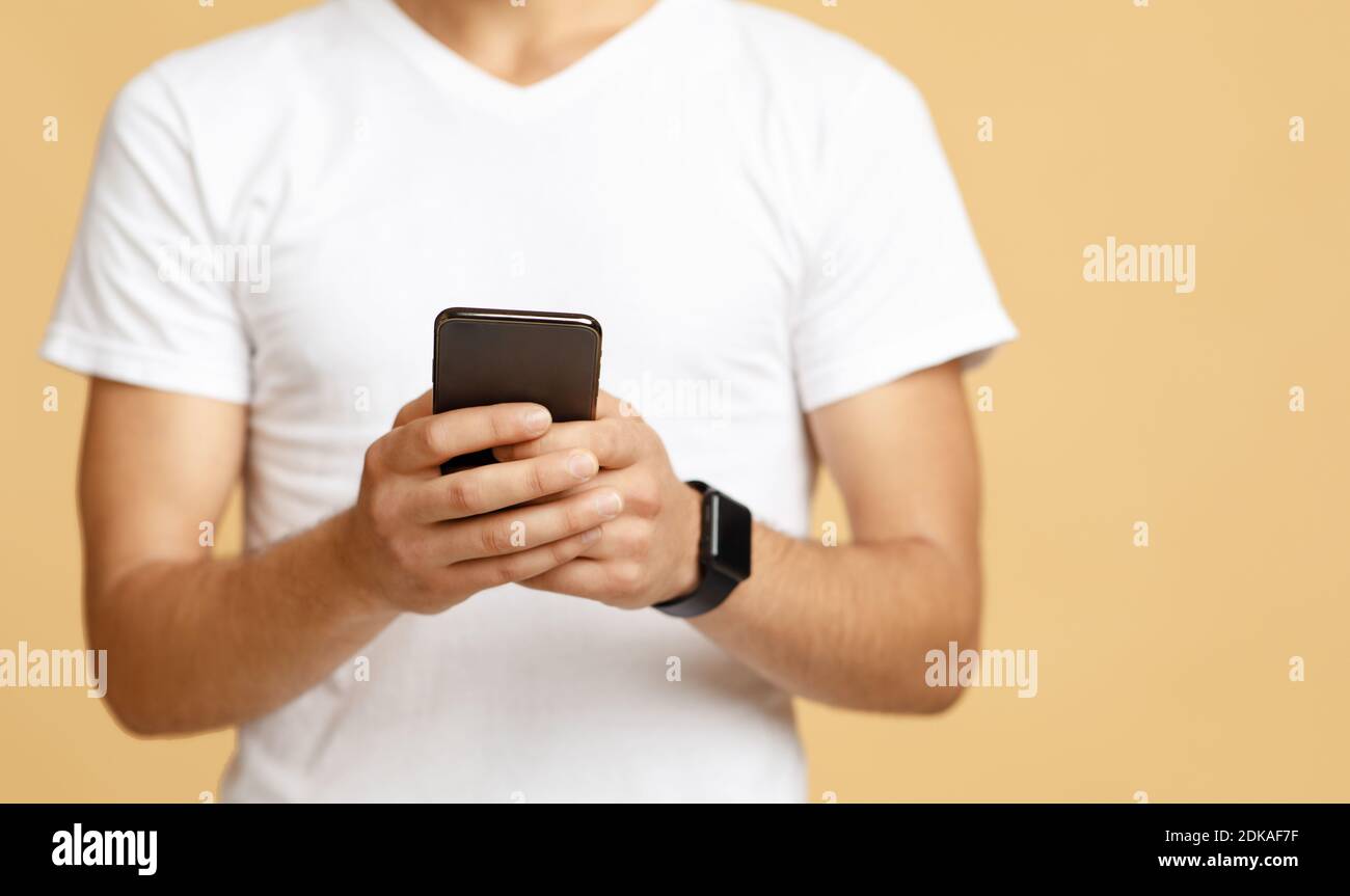 Social networks, blogs and mobile app. Smiling student watch in glasses ...