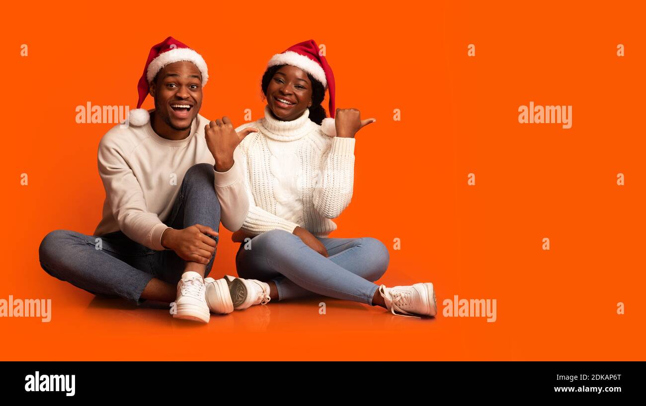 Joyful man woman in santa hi-res stock photography and images - Alamy