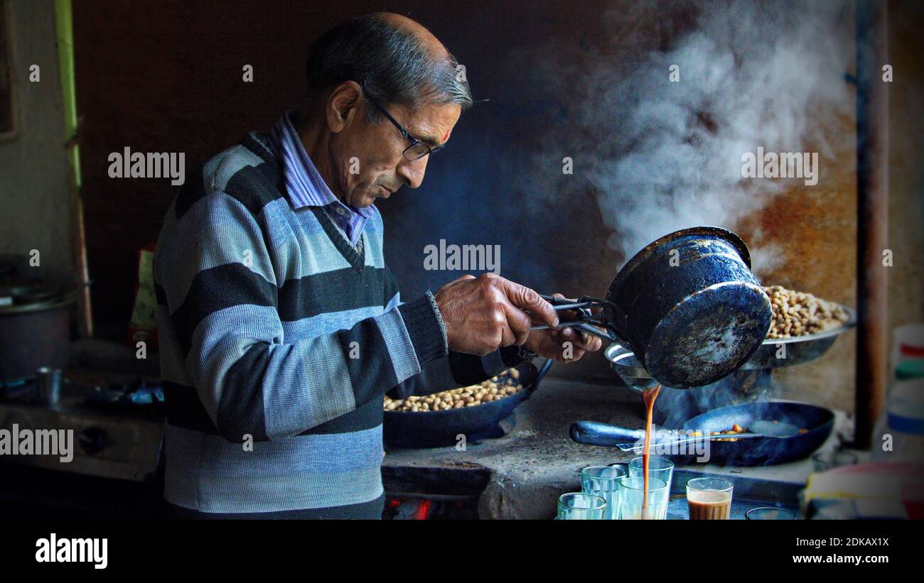 Man making indian tea in hi-res stock photography and images - Alamy