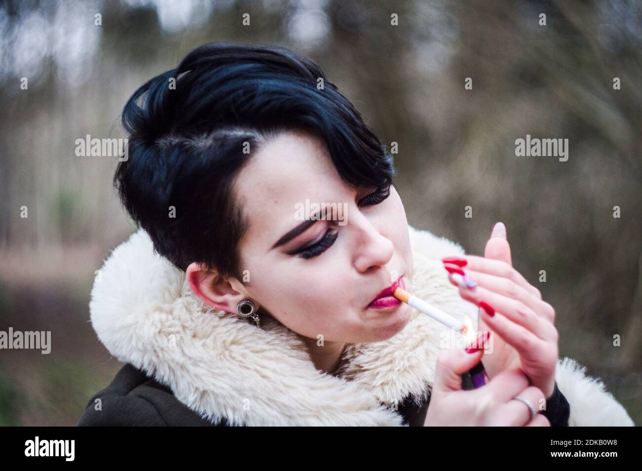 Woman Smoking Cigarette Forest High Resolution Stock Photography and ...