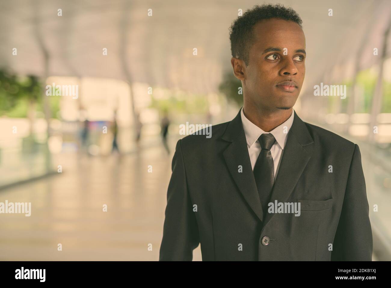 Young African businessman exploring the city of Bangkok, Thailand Stock ...