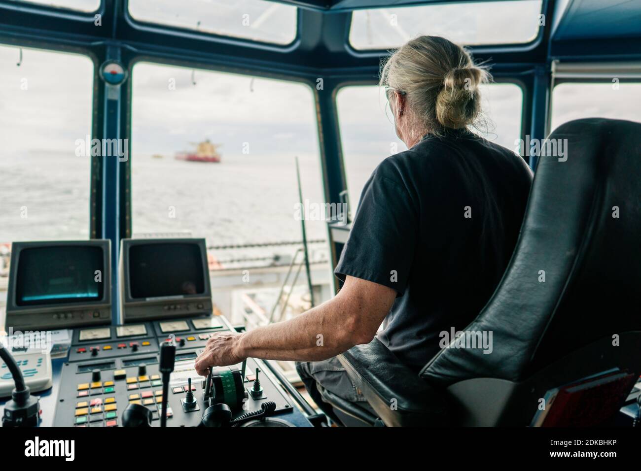 Captain of deck Officer on bridge of vessel or ship during navigaton ...