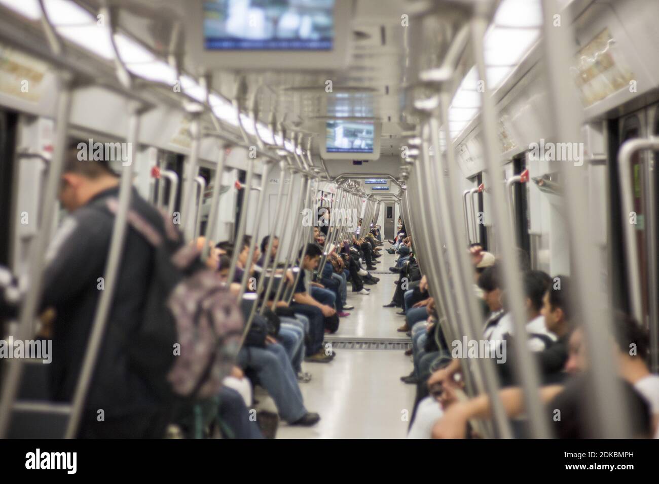 People standing in train commuter hi-res stock photography and images ...
