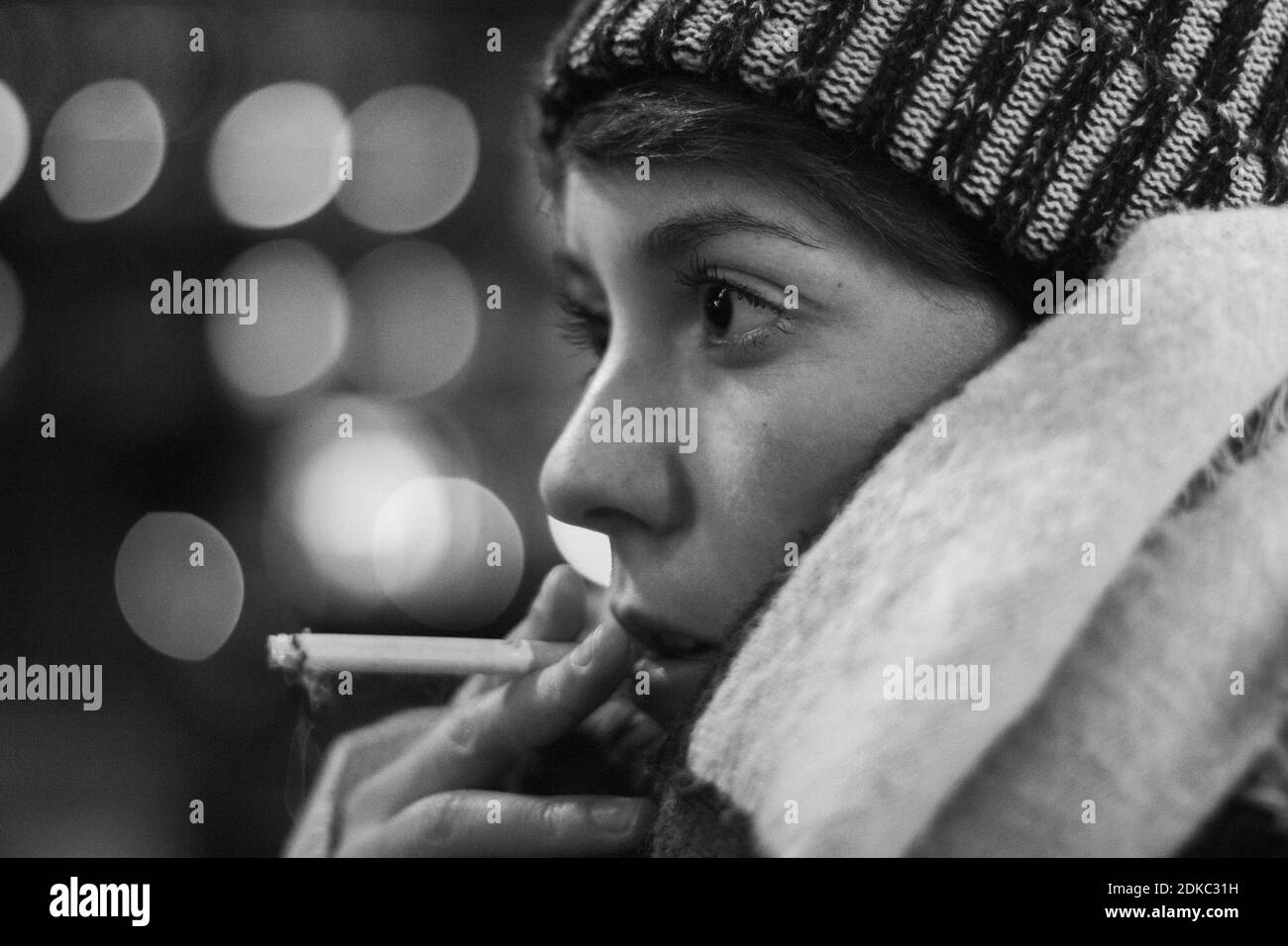 Woman smoking side view Black and White Stock Photos & Images - Alamy