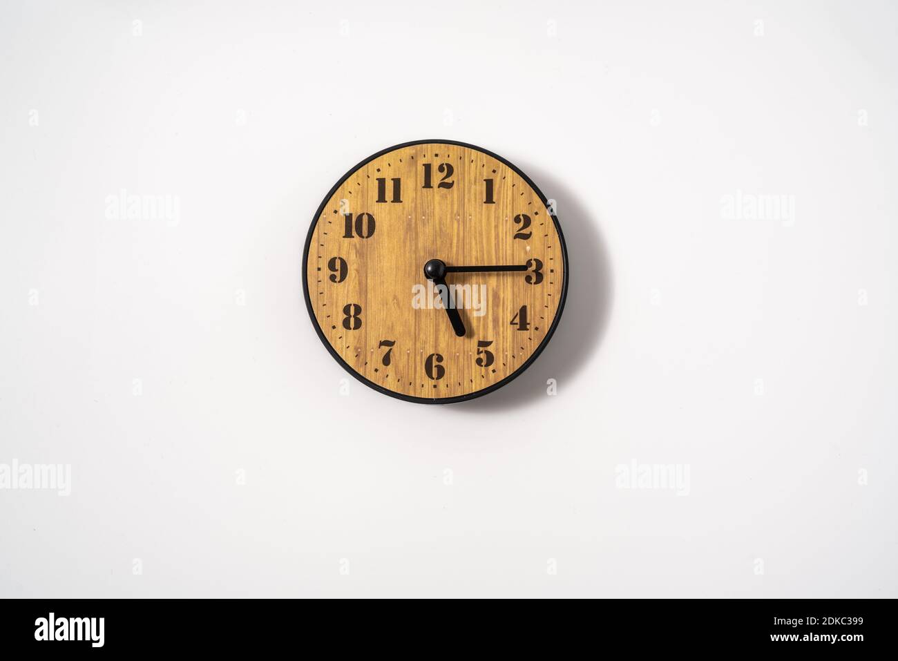 wood office wall clock with white dial on white background. wall clock ...
