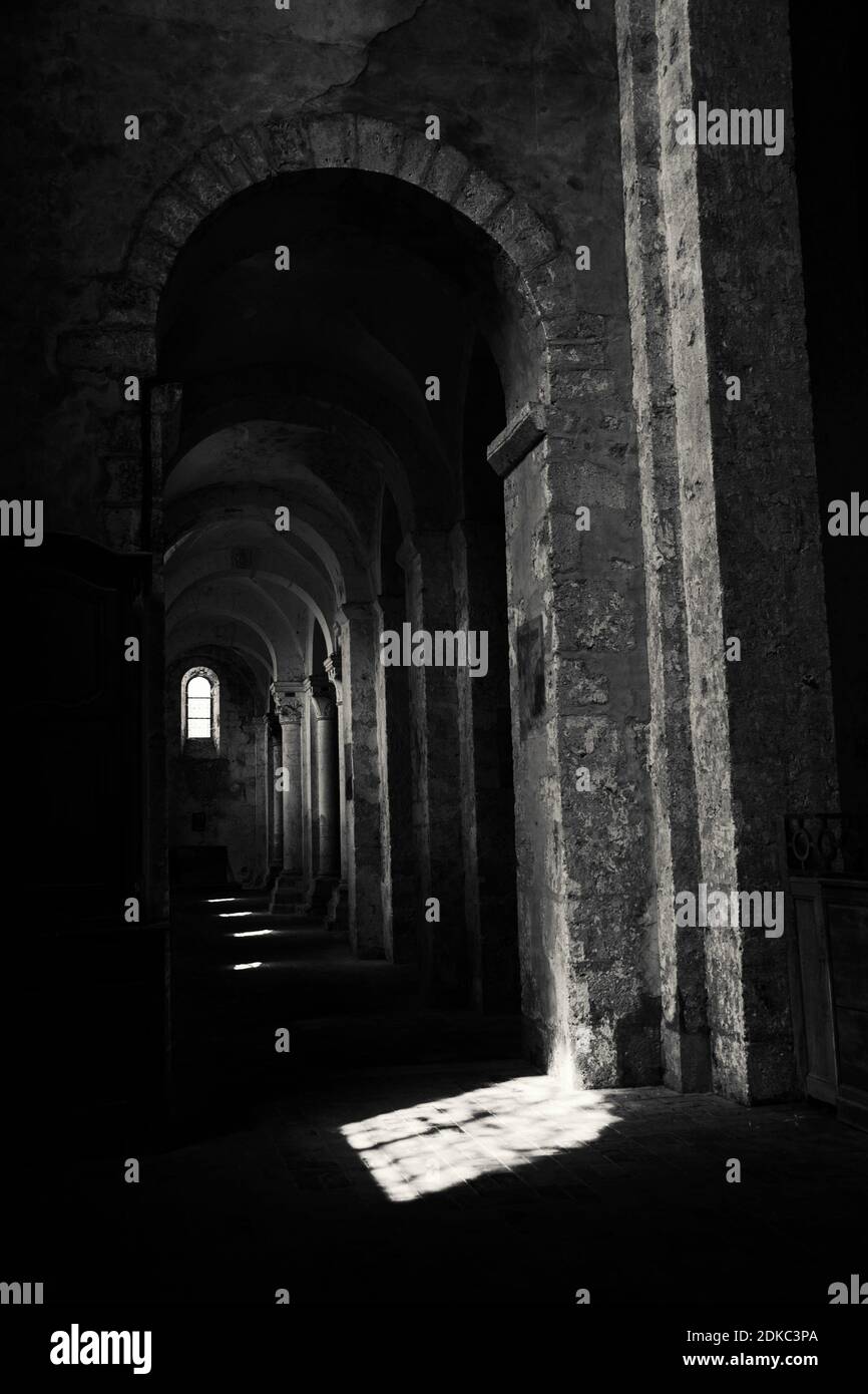 Sun light rays entering through the window into antique church. Light ...