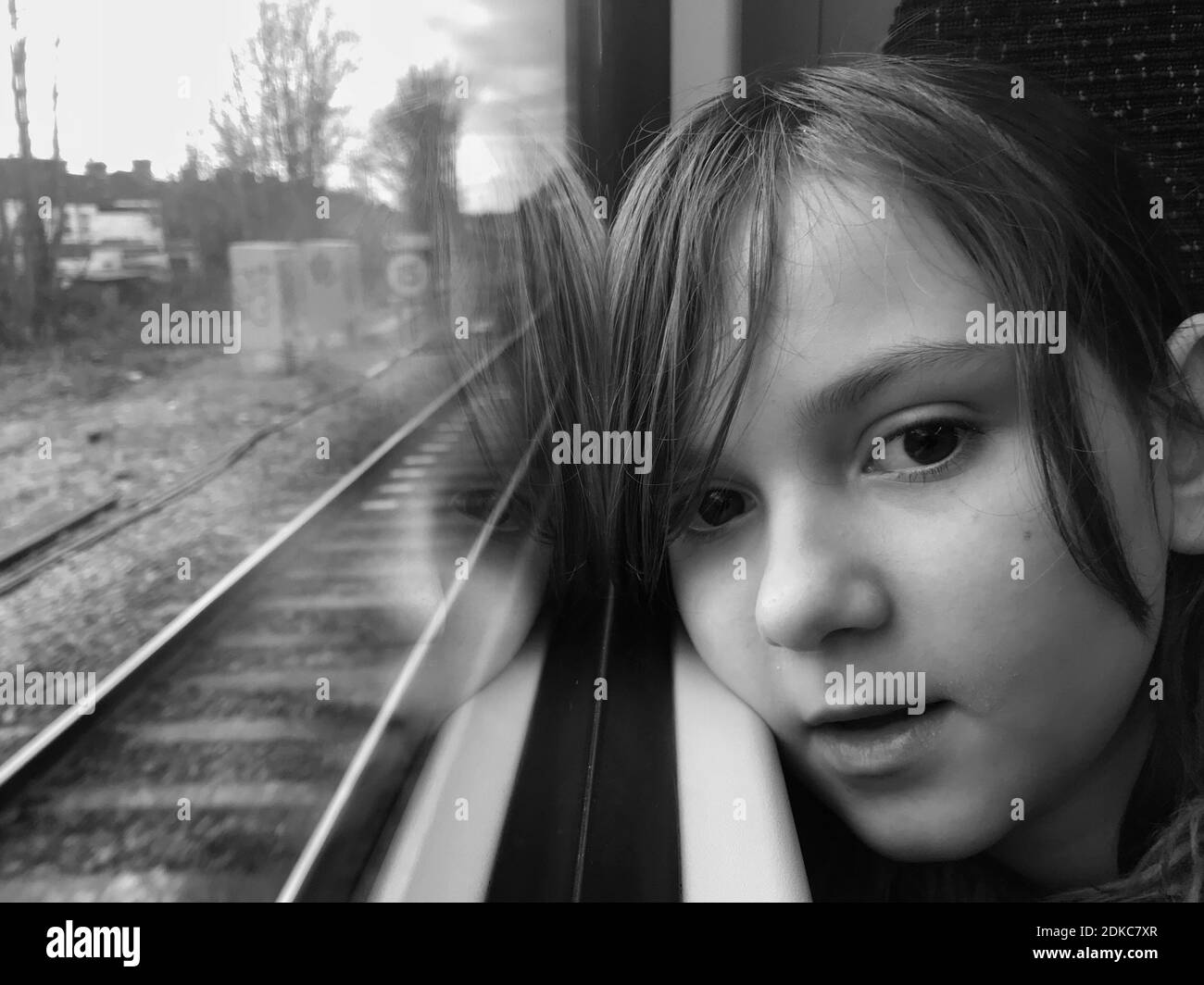 Girls face at window Black and White Stock Photos & Images - Alamy