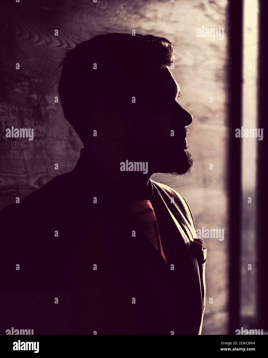 Side View Of Silhouette Man Standing Against Wall Stock Photo - Alamy