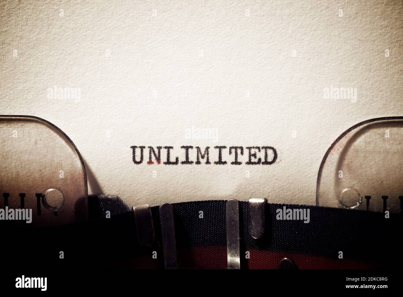 Unlimited word written with a typewriter Stock Photo - Alamy