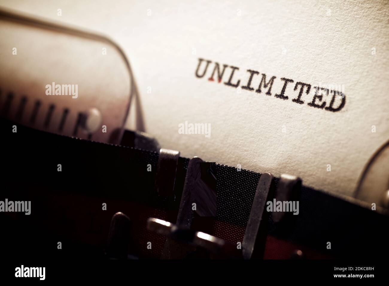 Unlimited word written with a typewriter Stock Photo - Alamy