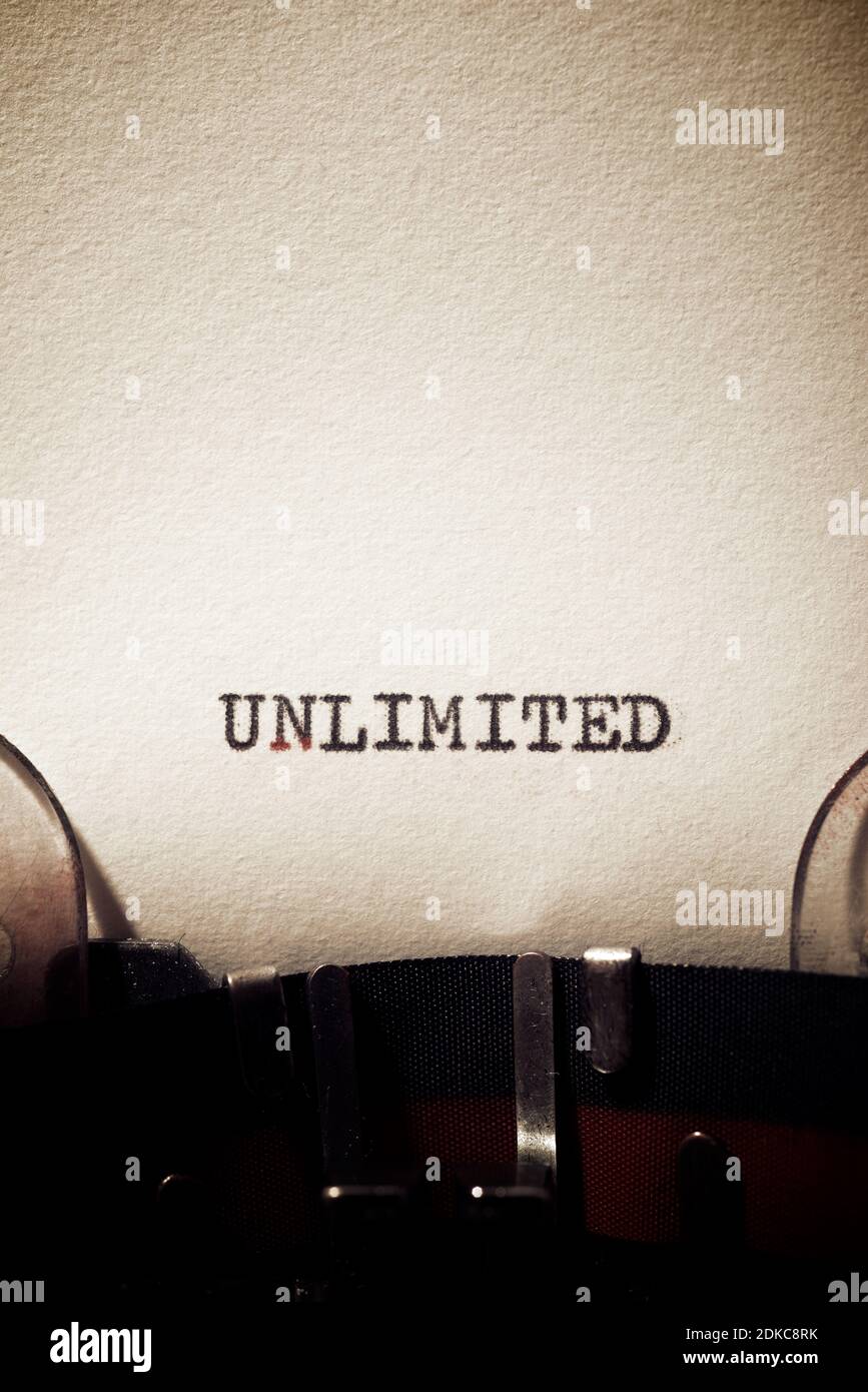 Unlimited word written with a typewriter Stock Photo - Alamy