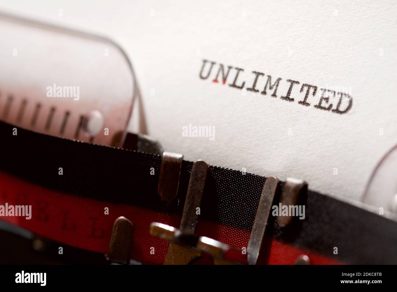 Unlimited word written with a typewriter Stock Photo - Alamy