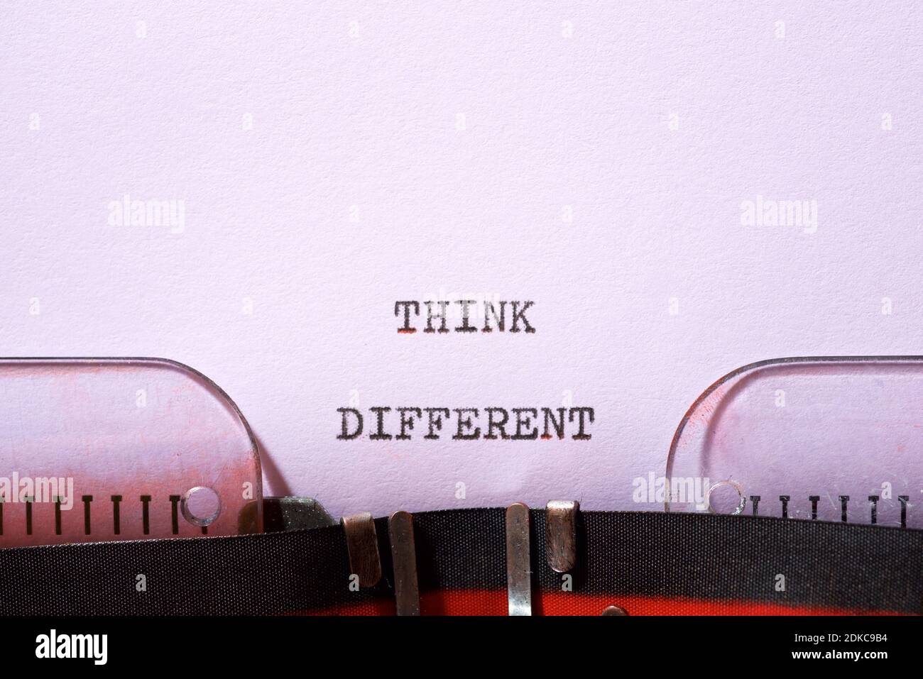 Think different phrase written with a typewriter Stock Photo - Alamy