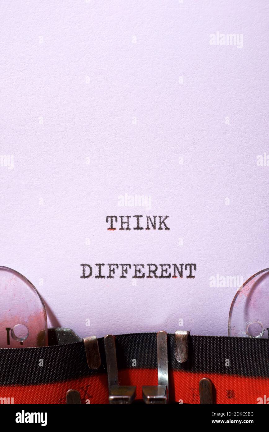 Think different phrase written with a typewriter Stock Photo - Alamy