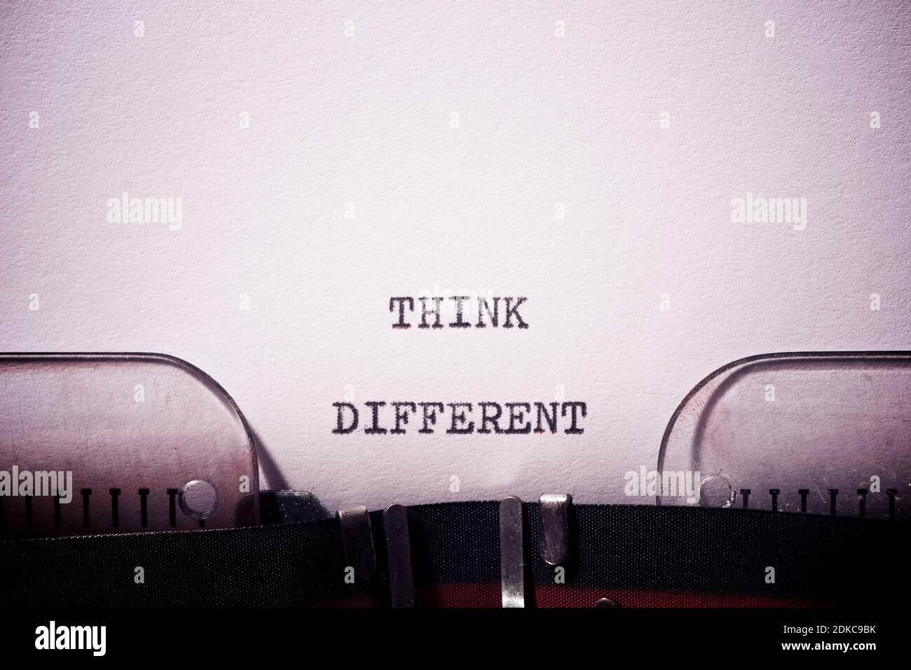 Think different phrase written with a typewriter Stock Photo - Alamy