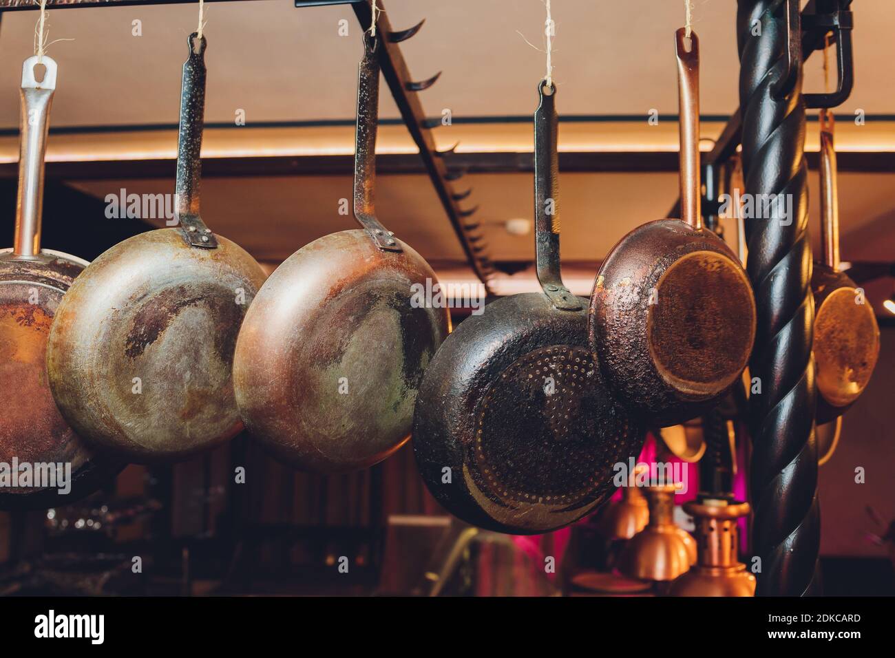 Hanging cast iron pans hi-res stock photography and images - Alamy