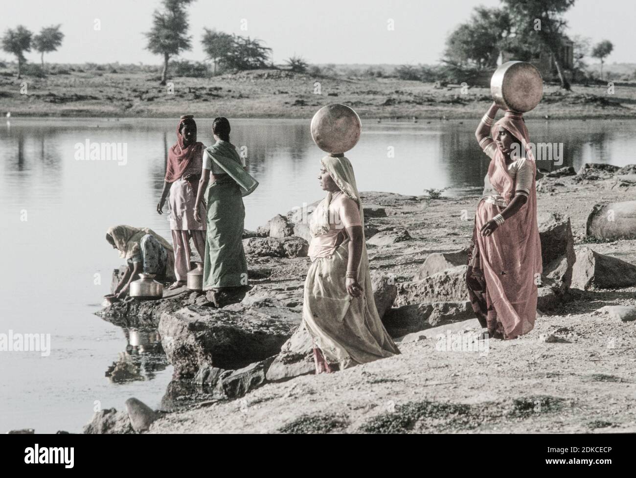 Woman fetch water hi-res stock photography and images - Alamy