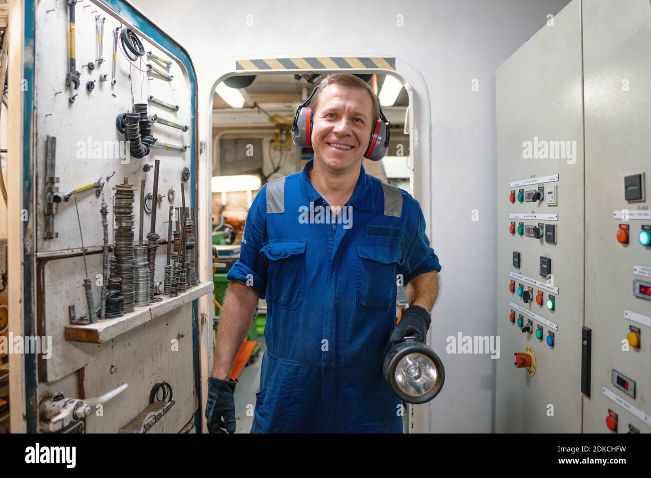 Marine engineer officer controlling vessel enginesand propulsion in ...