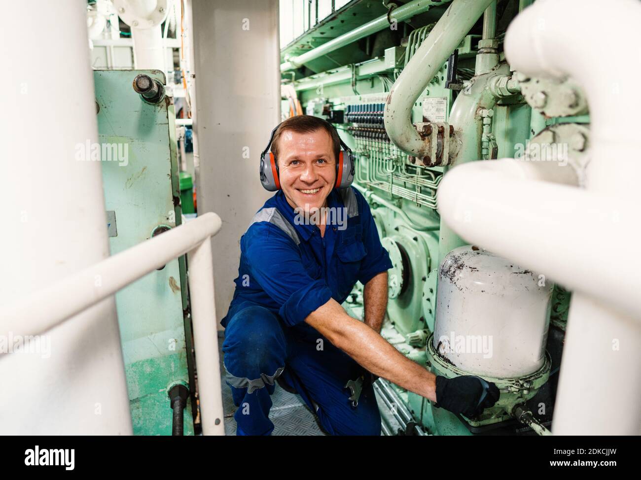 Marine engineer officer controlling vessel enginesand propulsion in ...