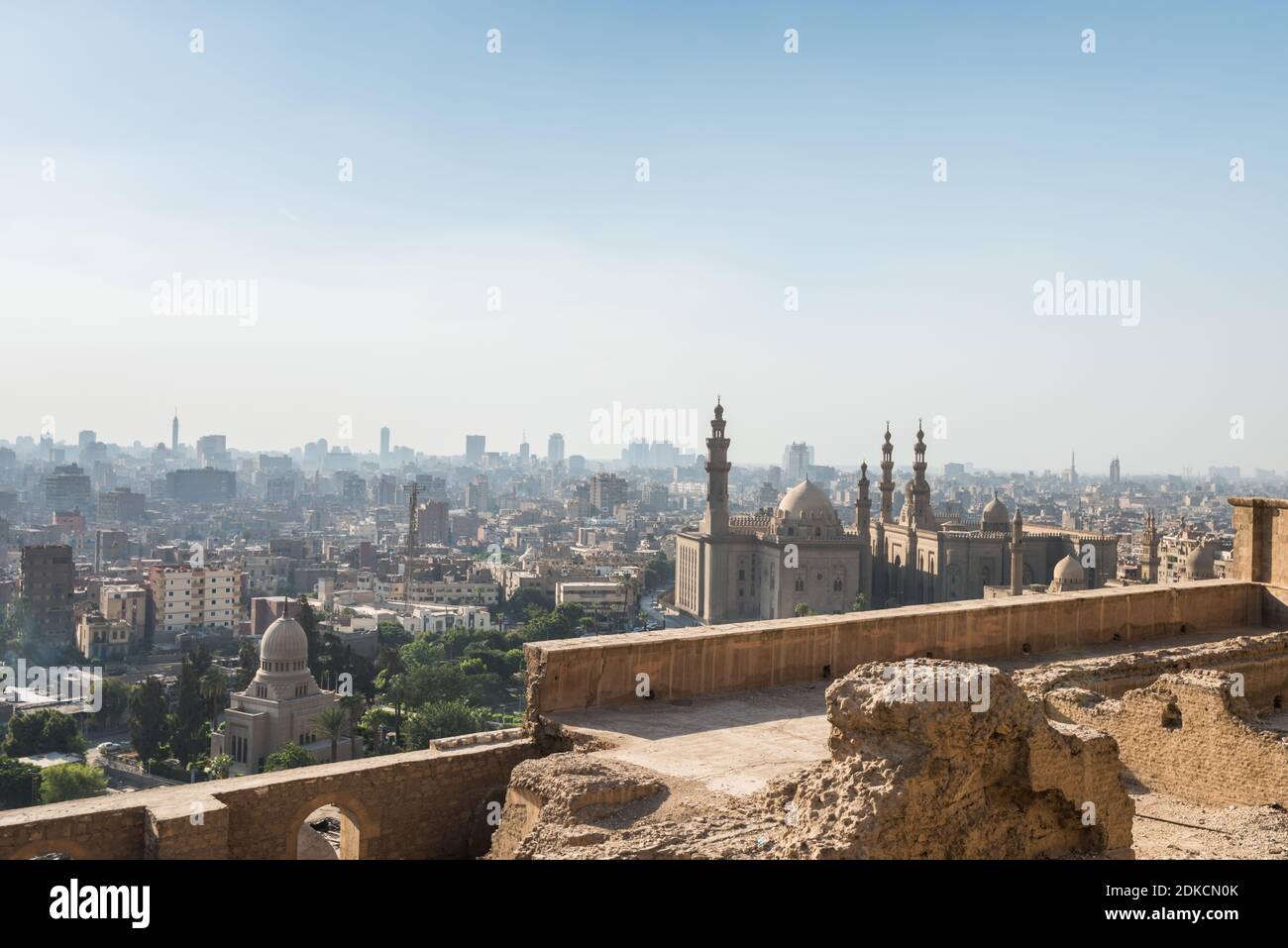 Aerial view of Cairo of crowded buildings with dust sky and mosque of ...