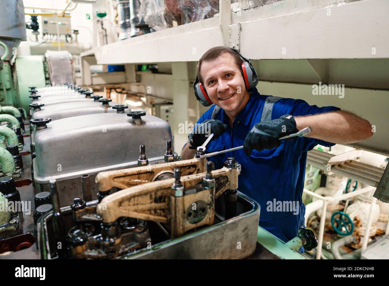 Marine engineer officer controlling vessel enginesand propulsion in ...