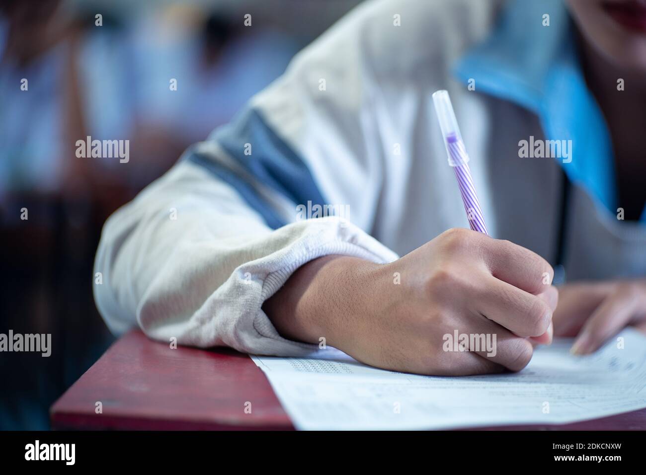 Student reading and taking exam with stress Stock Photo - Alamy