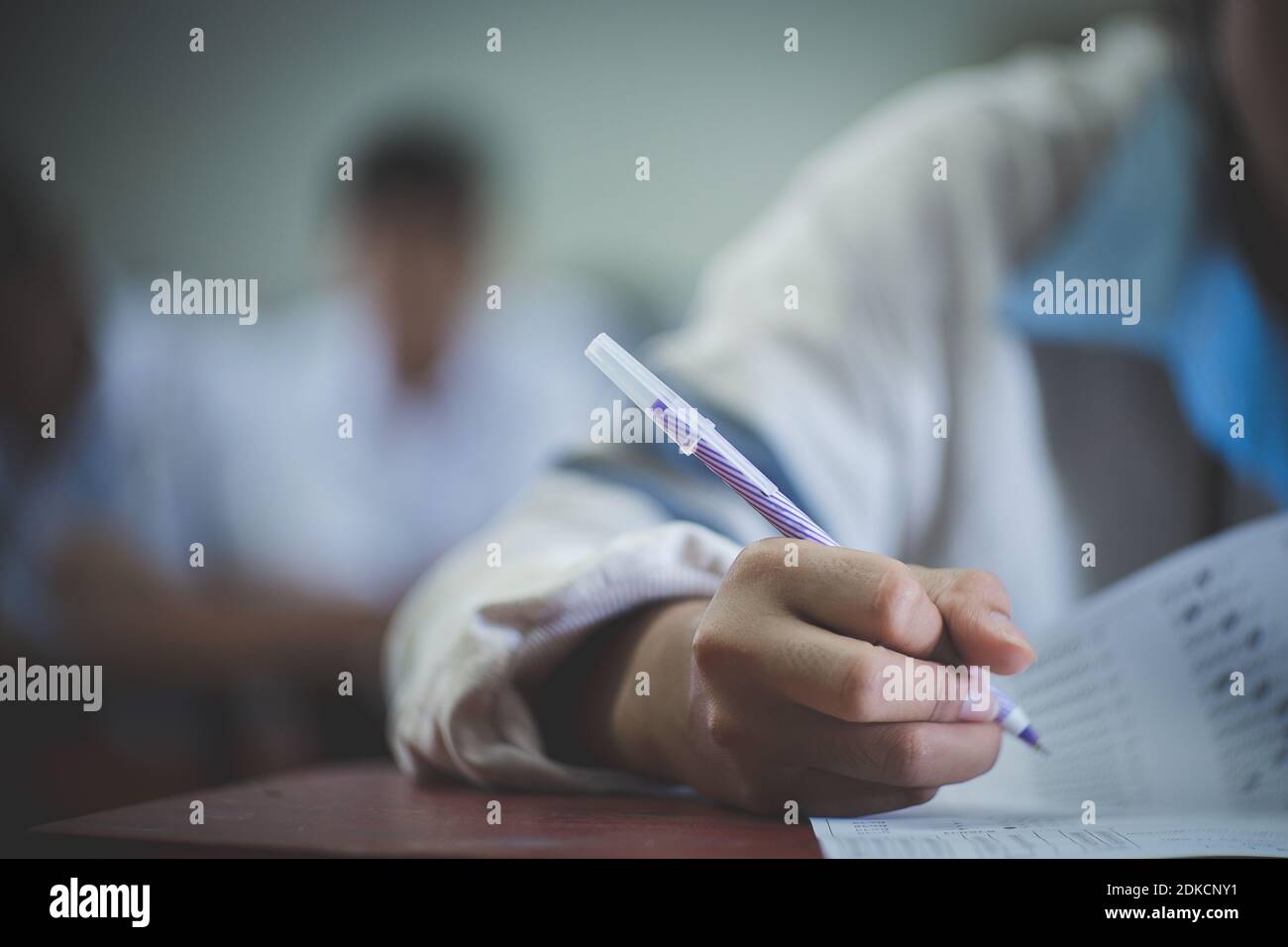 Student reading and taking exam with stress Stock Photo - Alamy