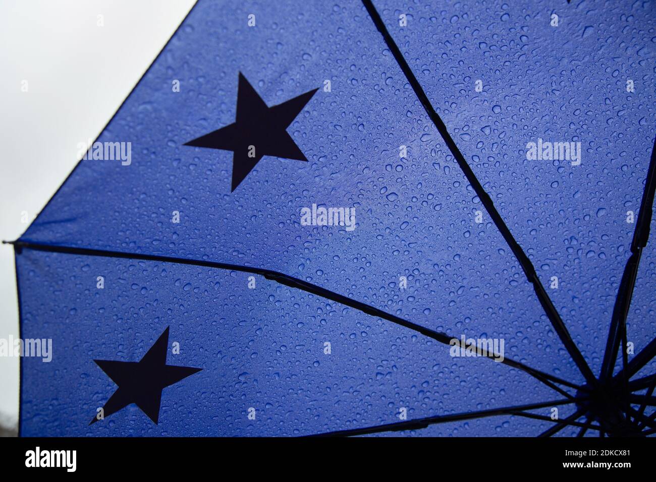 Umbrella with raindrops symbol hi-res stock photography and images - Alamy