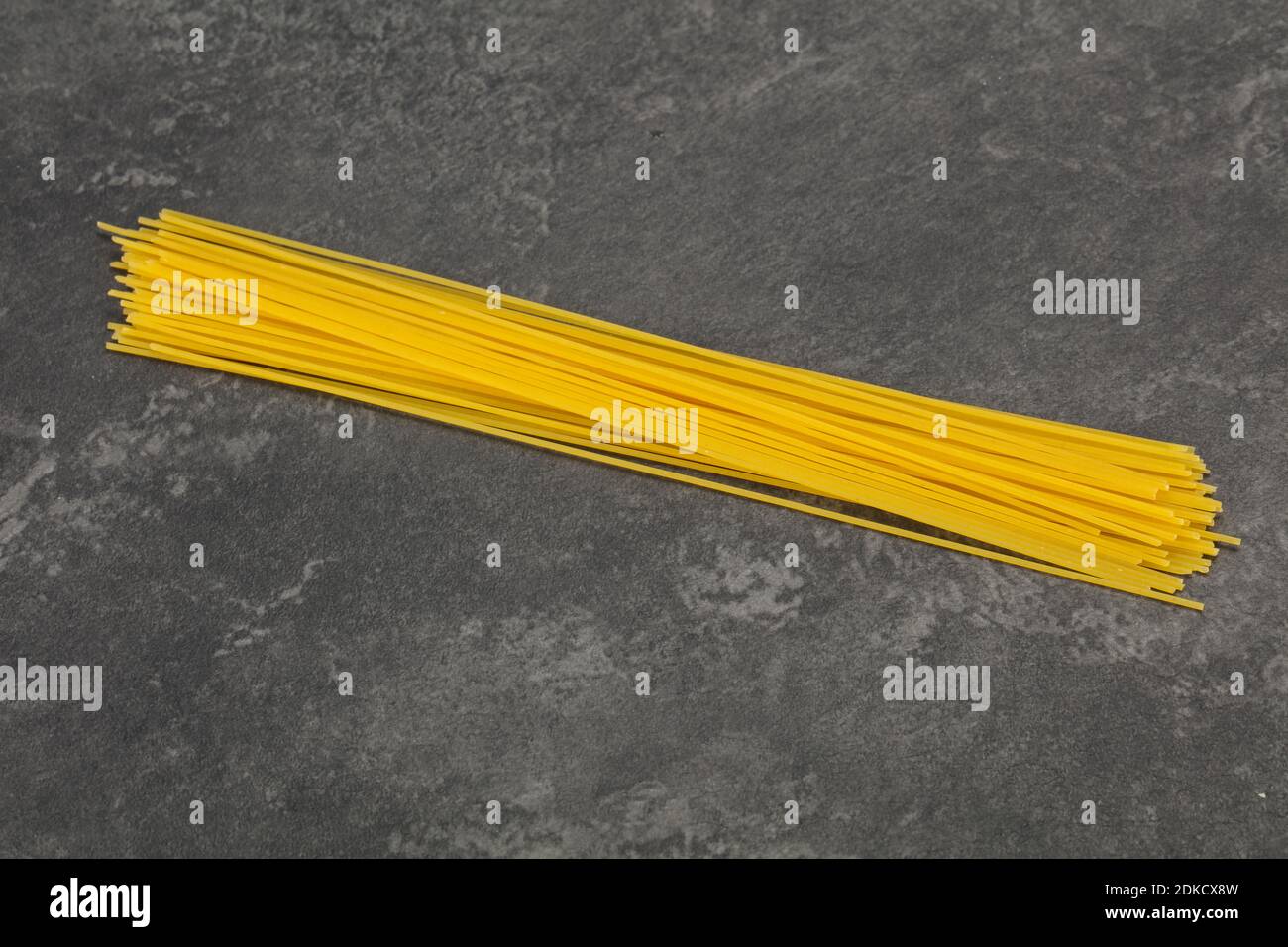 Dry raw spaghetti ready for bowling Stock Photo - Alamy