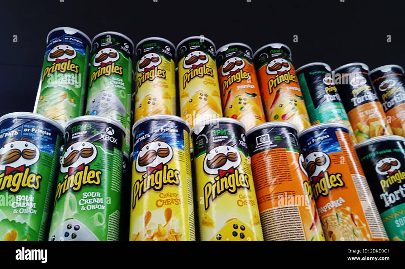 Pringles Chips is seen on store shelf Stock Photo - Alamy