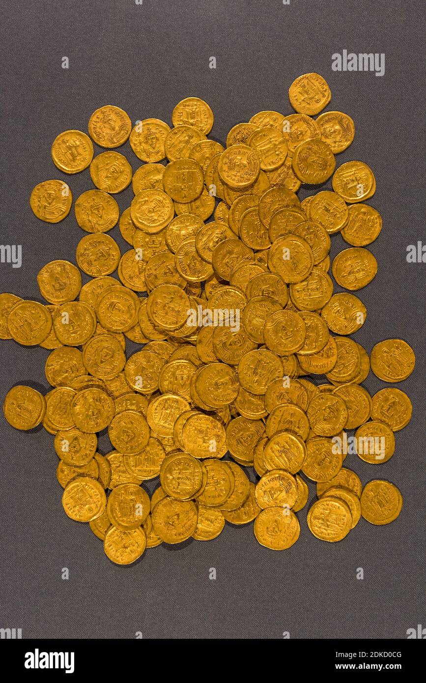 Coptic artifacts of golden coins in the museum Stock Photo - Alamy