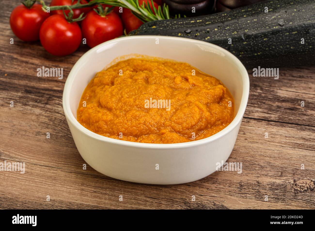 Vegetarian cuisine - Zucchini puree with herbs and spices Stock Photo ...