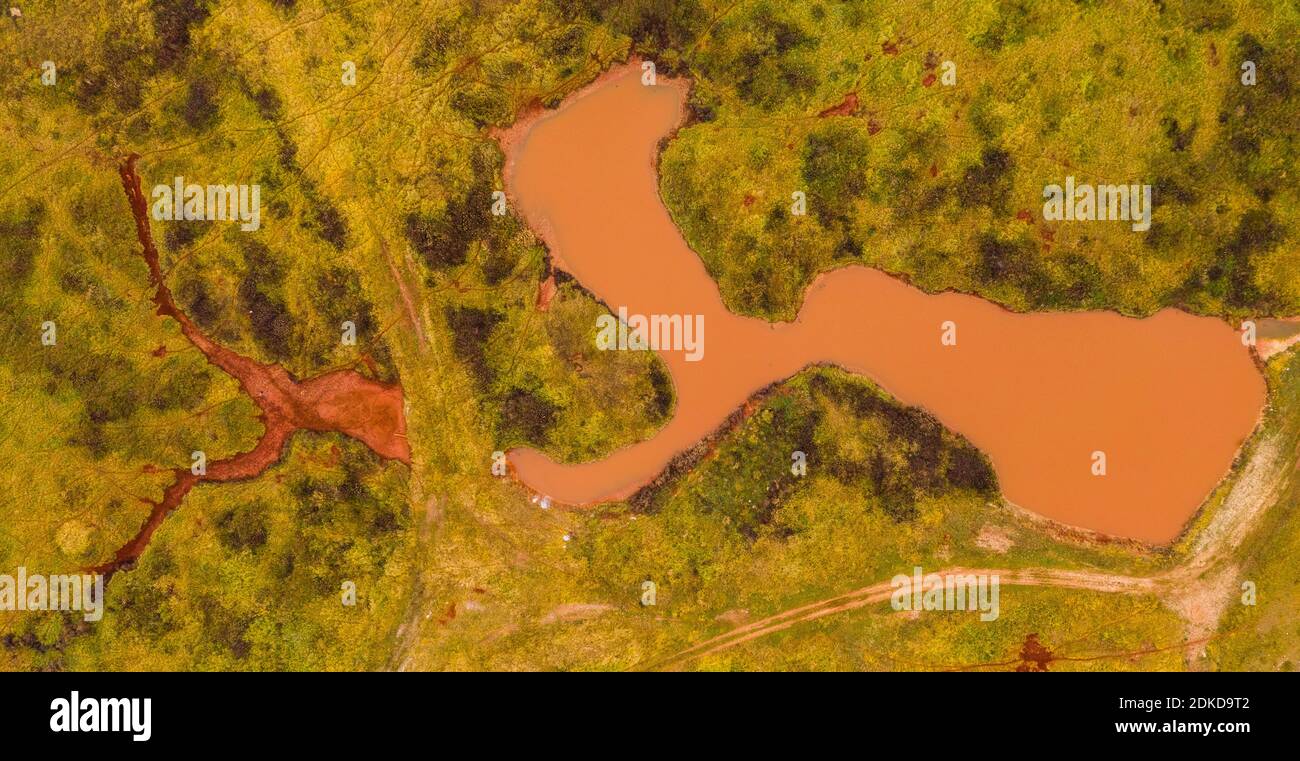 Aerial view of the famous red mud disaster site, abstract lines ...