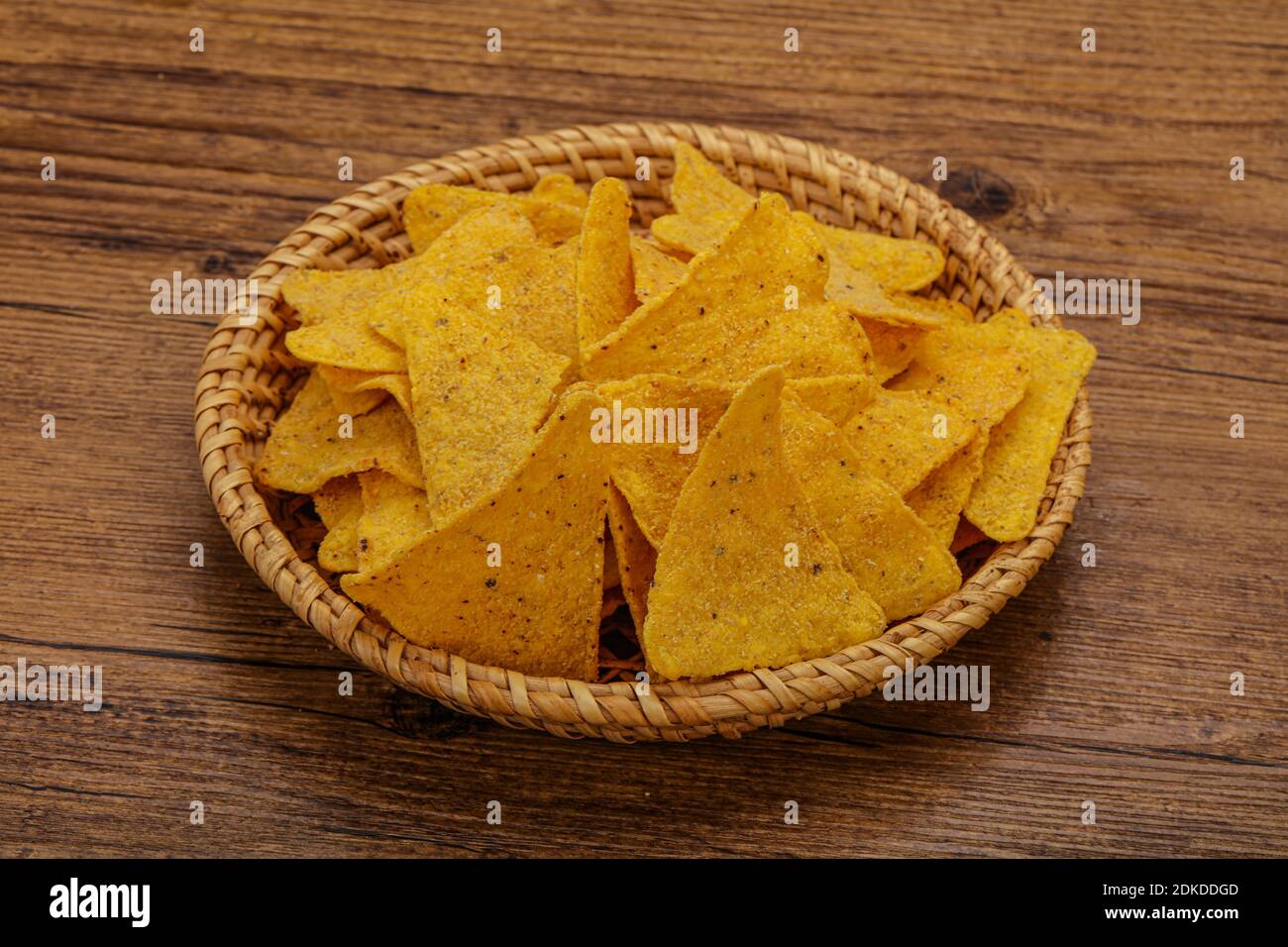 Mexican crunchy corn nachos triangle heap Stock Photo - Alamy